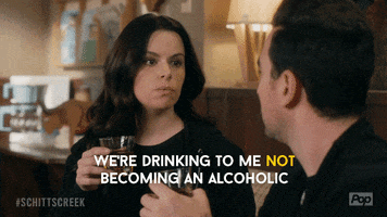 Emily Hampshire Drinking GIF by Schitt's Creek - Find & Share on GIPHY