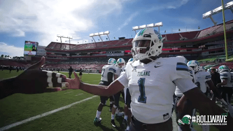 Football Handshake GIF by GreenWave - Find & Share on GIPHY