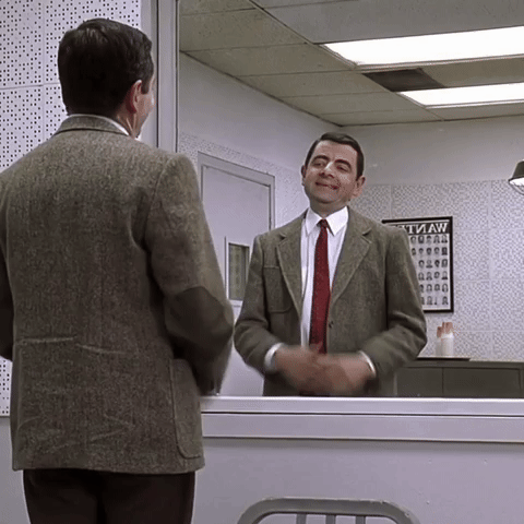 Posing Mr Bean GIF by Working Title - Find & Share on GIPHY