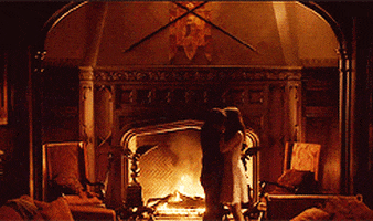 Kissing By The Fireplace GIFs - Get the best GIF on GIPHY