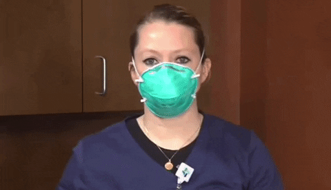How to Properly Wear an N95 Mask by GIPHY News | GIPHY